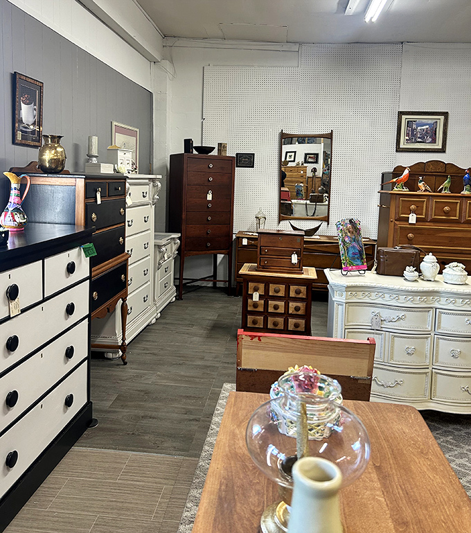 Dresser diplomacy&mdash;where black-and-white modernism meets traditional wood in perfect furniture harmony.