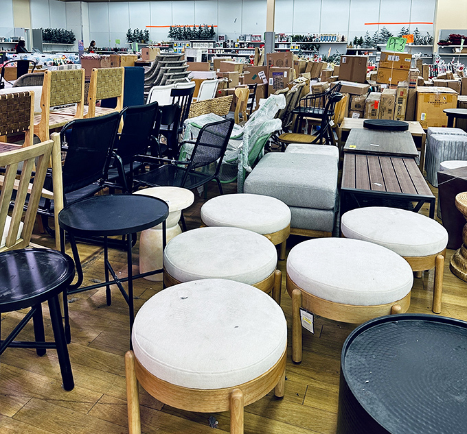 The furniture section: where mid-century modern meets budget-friendly prices. These cream ottomans are practically begging to support tired shopping feet.