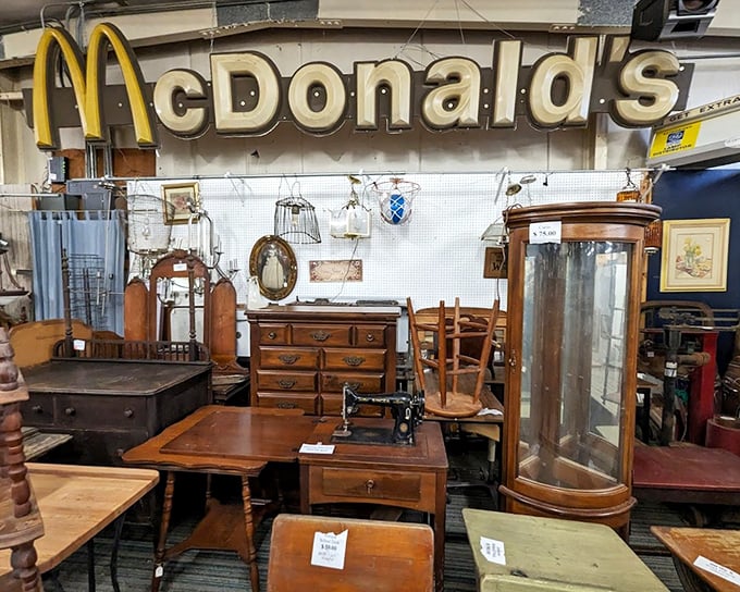 That McDonald's sign isn't just nostalgic—it's architectural salvage gold! Fast food history looming over carefully curated furniture finds.
