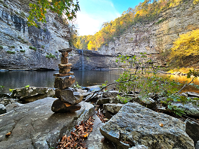 Rock stacking: the original Jenga for nature lovers. This peaceful gorge view with balanced stones captures the meditative side of outdoor adventure.