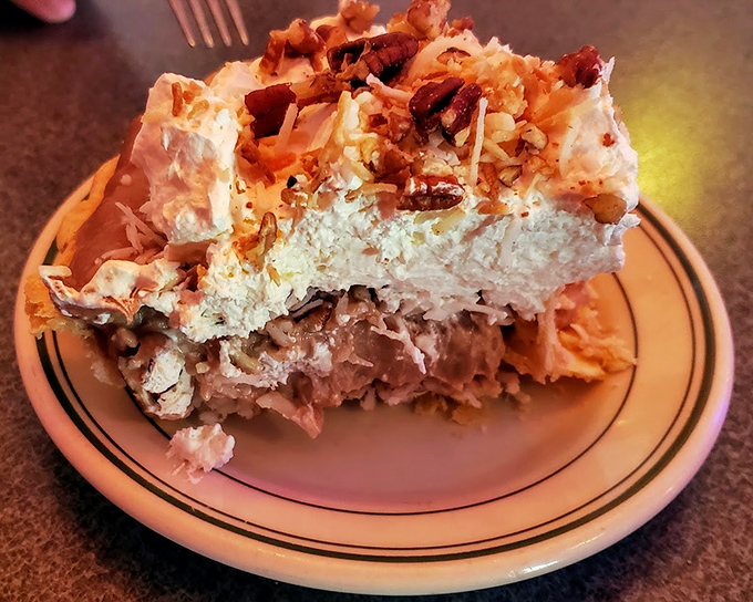 German chocolate pie that makes you question why anyone bothers with birthday cake&mdash;layers of coconut, chocolate, and whipped cream creating the holy trinity of dessert perfection.