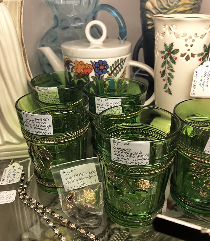 Colored glassware catches light like edible gemstones, making Depression-era drinking vessels look downright cheerful now.