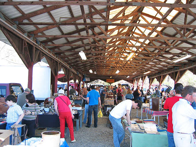 Under this pavilion, one person's dusty attic becomes another's vintage jackpot every weekend morning.