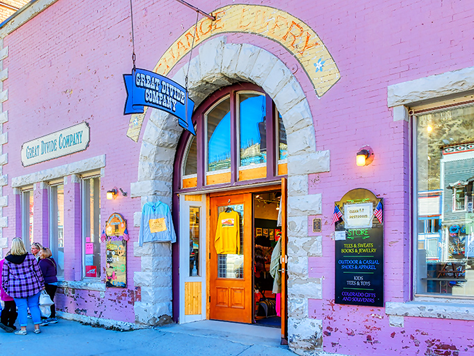 The Great Divide Company's purple storefront pops against the blue Colorado sky, offering treasures for visitors who appreciate mountain town retail therapy.