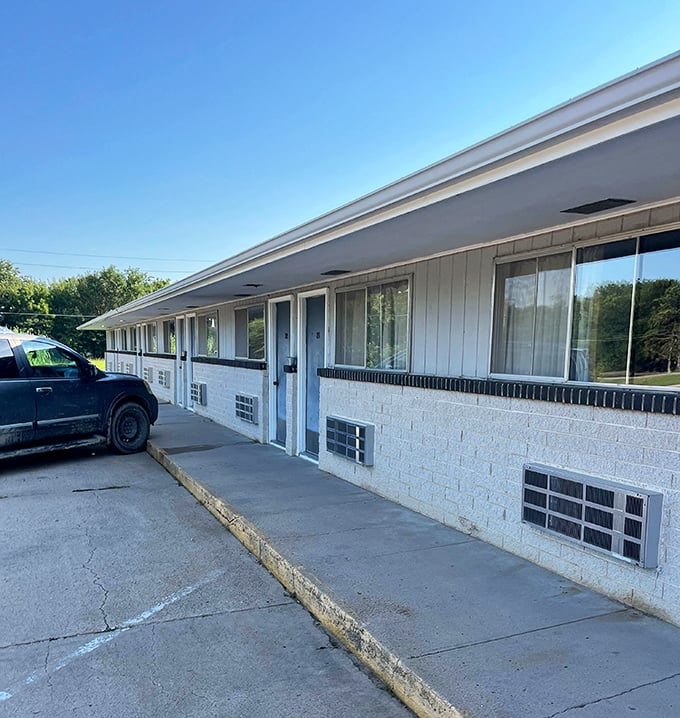Simple accommodations with prairie practicality—the motel offers a no-frills place to rest your head after a day of literary pilgrimages.