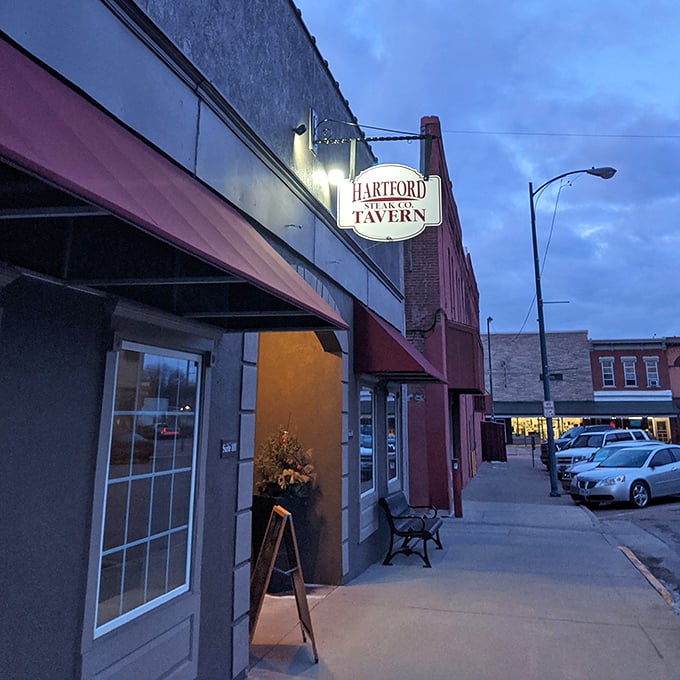 Hartford Steak Co. Tavern glows with evening promise&mdash;where dinner conversations flow as smoothly as their perfectly-timed medium-rare offerings.