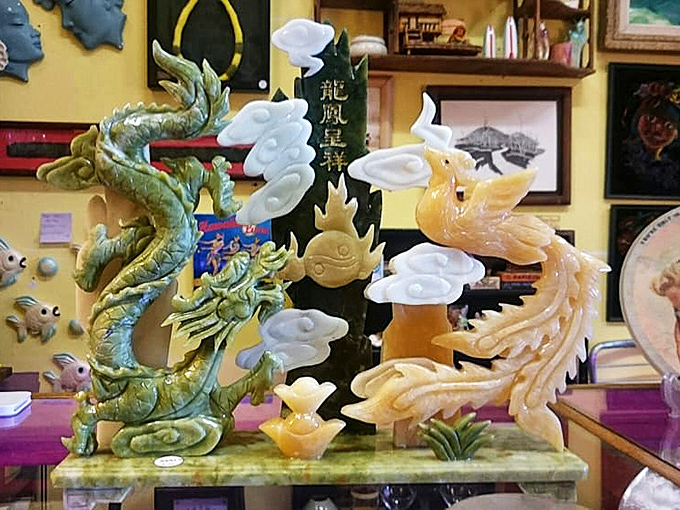 These jade dragons dance across time and cultures, representing the rich tapestry of Asian influences that have shaped Hawaii's unique identity.