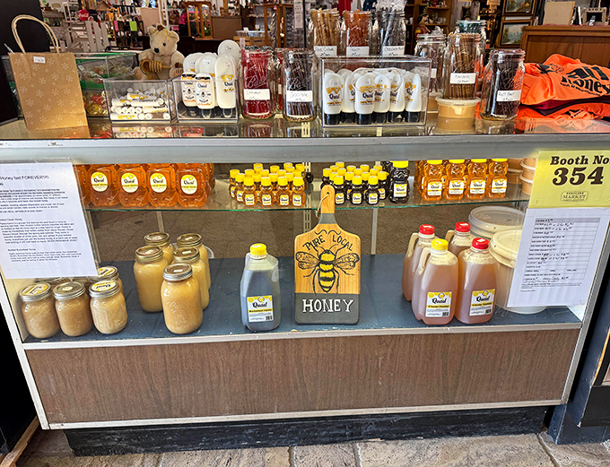 Liquid gold in glass jars—local honey that makes store-bought varieties taste like they've been keeping secrets about what honey should actually taste like.