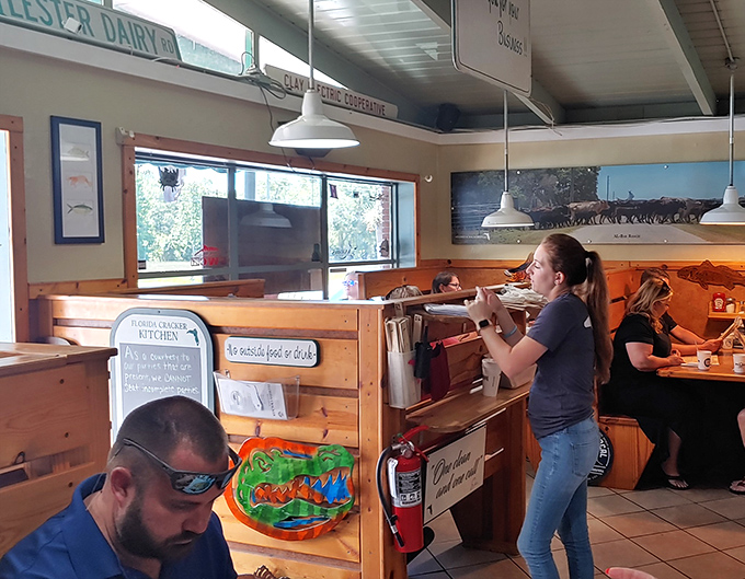 The order counter welcomes you with rustic charm and the promise of culinary treasures that have locals lining up before the roosters crow.