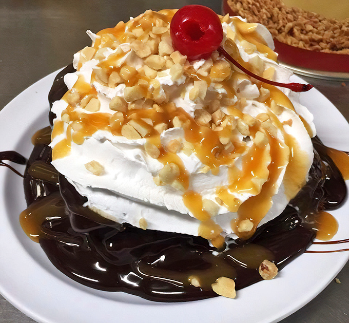 A mountain of whipped cream drizzled with caramel and topped with nuts. Desserts here aren't an afterthought&mdash;they're the encore.