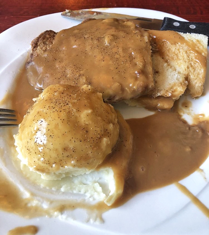 Hot pork tenderloin swimming in gravy&mdash;comfort food that hugs your insides like a warm sweater on a cold day.