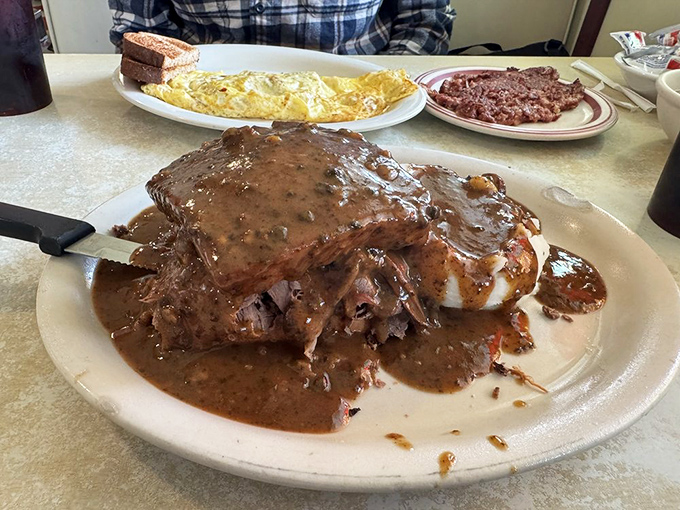 The hot roast beef sandwich&mdash;where gravy isn't just an addition but a divine flood that transforms bread and meat into something transcendent.
