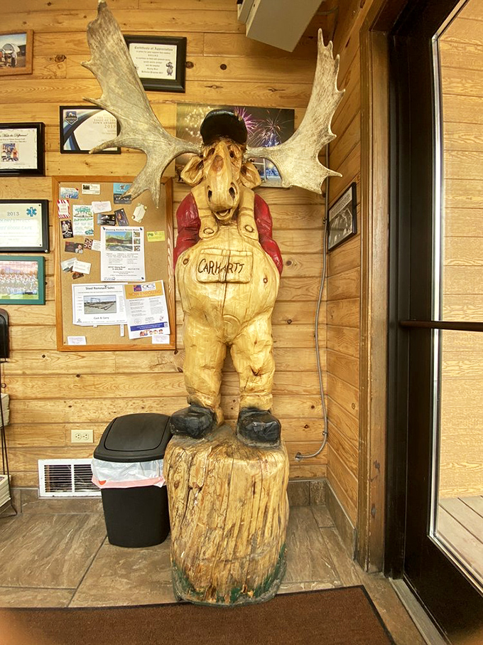 Moose antlers and wooden walls create the perfect Alaskan backdrop for serious breakfast decisions. This isn't decoration—it's a lifestyle statement.