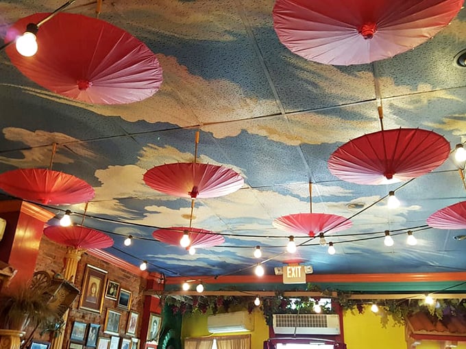 Those pink umbrellas dancing across the sky-blue ceiling aren't just decoration&mdash;they're conversation starters. "Remember that Italian place with the umbrellas?" You will.