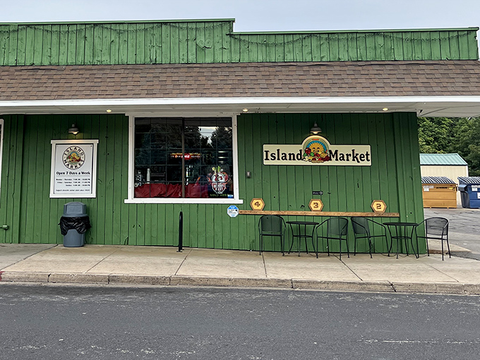 Island Market's cheerful green exterior invites locals to grab essentials without the fluorescent-lit maze of big-box stores, proving convenience doesn't require corporate ownership.