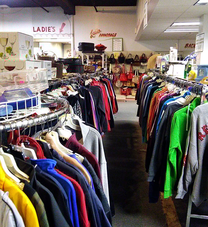 The ladies' section reveals a kaleidoscope of colors and textures – with handbags hanging like ripe fruit ready for the picking.