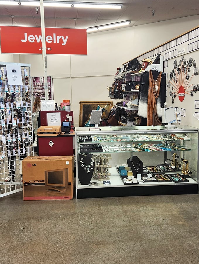 The jewelry counter gleams with possibility. Behind that glass lies someone's former statement piece, waiting to become your new conversation starter.