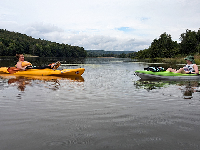 Kayaking on Chapman Lake &ndash; where conversations happen at a distance that makes it impossible to hear complaints about who forgot the sunscreen.