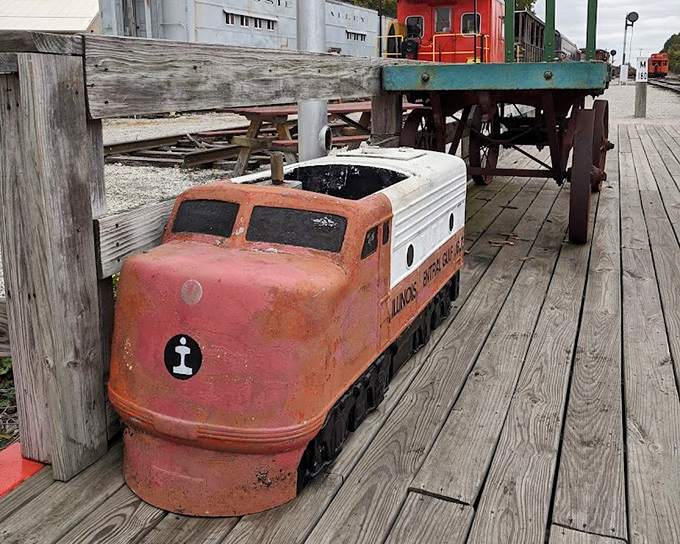 Another angle of the delightful kiddie train shows how even the smallest visitors can connect with Indiana's railroad heritage through hands-on experiences.