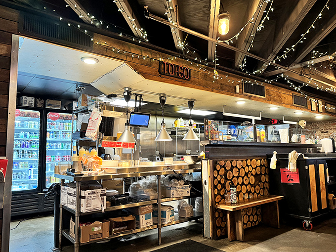 Behind the scenes, wood-fired smokers work their magic transforming raw meat into something absolutely transcendent.