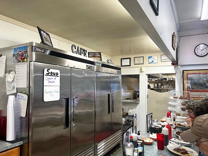 The kitchen &ndash; command central for comfort food operations. That handwritten soup sign speaks volumes about homemade priorities.