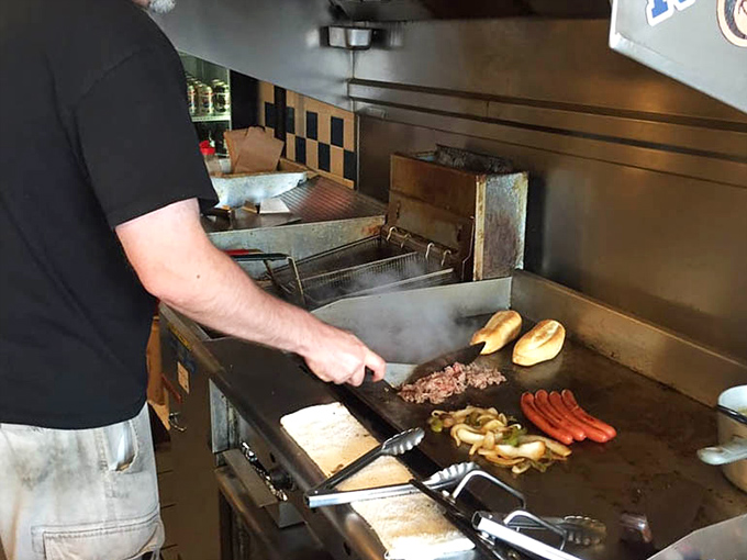 The flat-top grill&mdash;hallowed ground where dogs and buns achieve their perfect union through the sacred ritual of proper griddling.