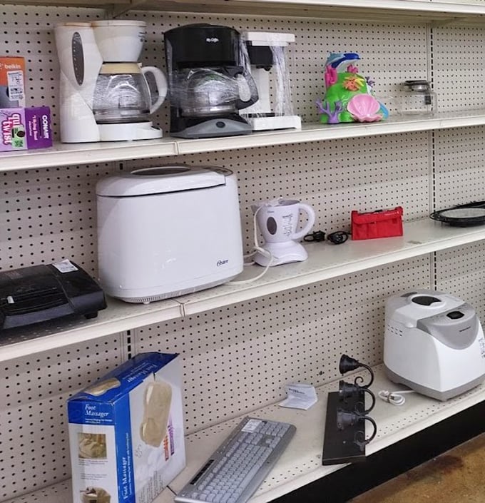 Small appliance heaven, where bread makers and coffee pots dream of counter space in new kitchens. Every gadget tells a story.