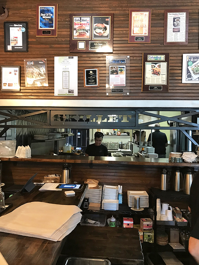 A glimpse into the kitchen reveals the choreographed dance of culinary creation&mdash;where the magic happens behind a wall of well-earned accolades.