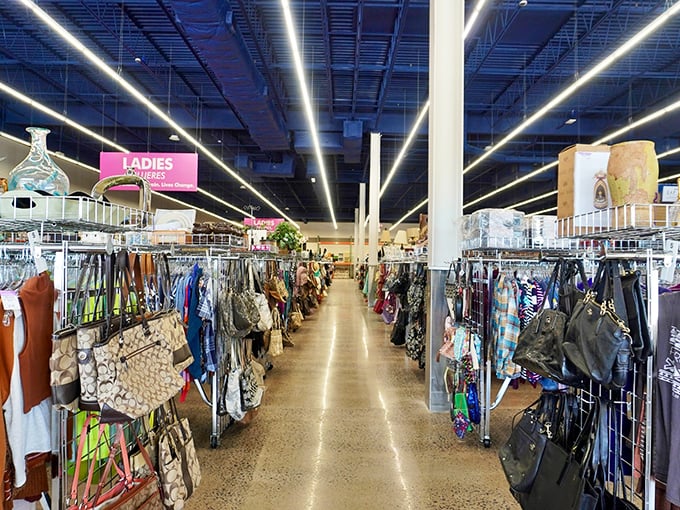 Handbags and accessories line the aisle like an affordable fashion runway. Designer labels occasionally hide among more humble offerings.