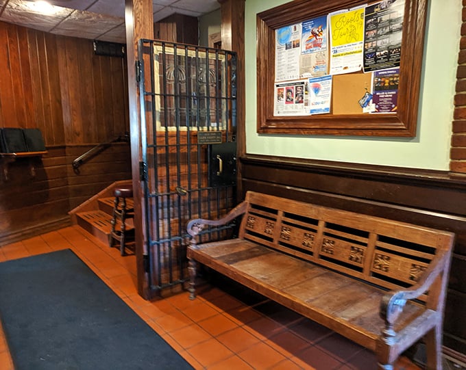 That vintage bench and iron gate entrance aren't just decorative touches&mdash;they're reminders of the building's storied past in Fort Wayne's history.