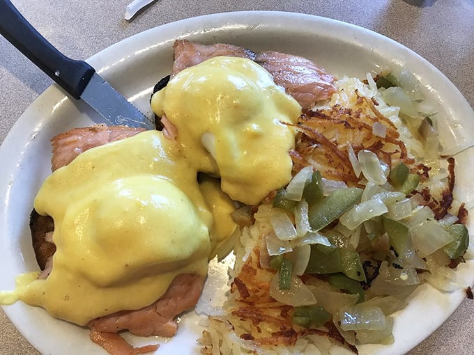 The Eggs Benedict at Michael's &ndash; where hollandaise sauce flows like liquid sunshine over Canadian bacon.