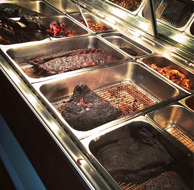 Behind the counter, smoked meats lie in their steel cradles like slumbering giants, ready to become into someone&rsquo;s perfect lunch.