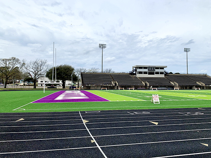 Memorial Stadium's purple and green field awaits Friday night lights, where local heroes are born and community bonds are strengthened with every touchdown.
