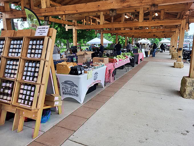 The farmers market pavilion transforms weekends into social events where the produce traveled fewer miles than you did.