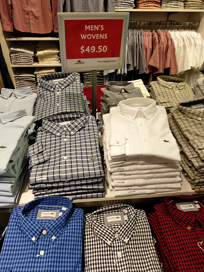 Lacoste shirts stacked with military precision. The alligator army stands ready to upgrade your wardrobe at prices that won't bite your budget.