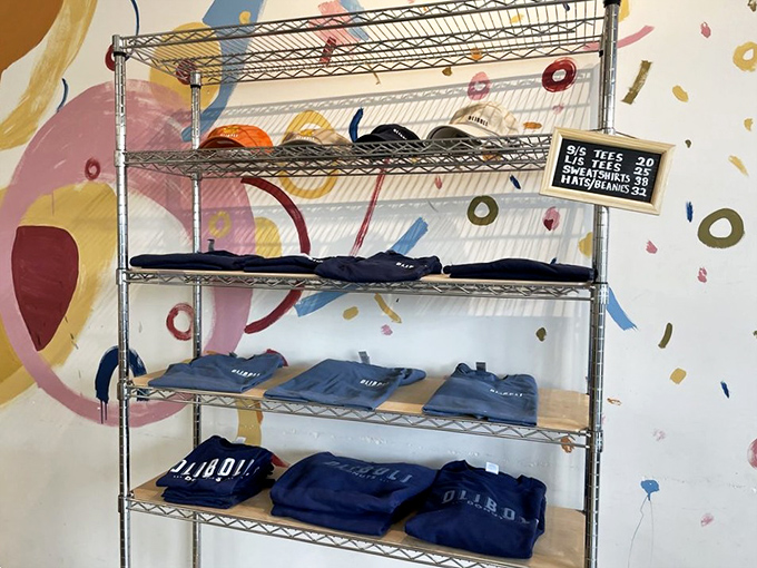 Even the merch wall tells a story – these aren't just t-shirts, they're badges of honor for the donut-obsessed among us.