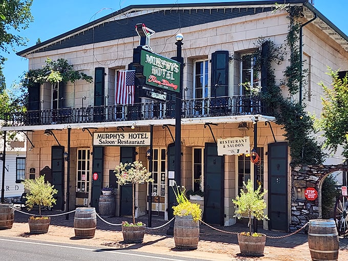 Murphys Historic Hotel stands proudly on Main Street, its wooden barrels and American flag announcing: "Mark Twain slept here, and you should too."