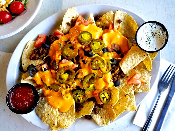 Nachos that require a strategy to eat&mdash;each chip a vehicle for the perfect ratio of cheese, jalape&ntilde;os, beans, and salsa. Delicious architecture.