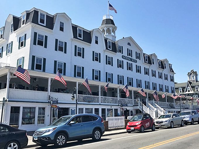 The National Hotel stands as the grand white sentinel of Old Harbor. Its porch has witnessed generations of island stories and countless sunset toasts.