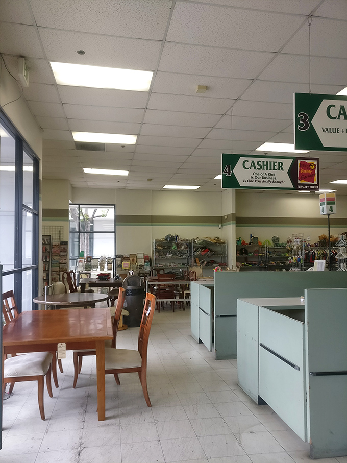 The cashier area doubles as a furniture showroom. That dining set has probably hosted more interesting conversations than most restaurant tables in town.