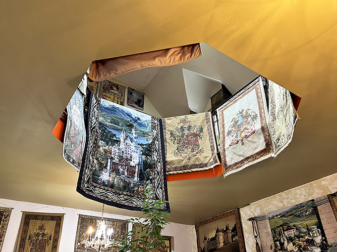 Look up! This ingenious ceiling display of tapestries transforms an ordinary room into an extraordinary experience that keeps eyes skyward.