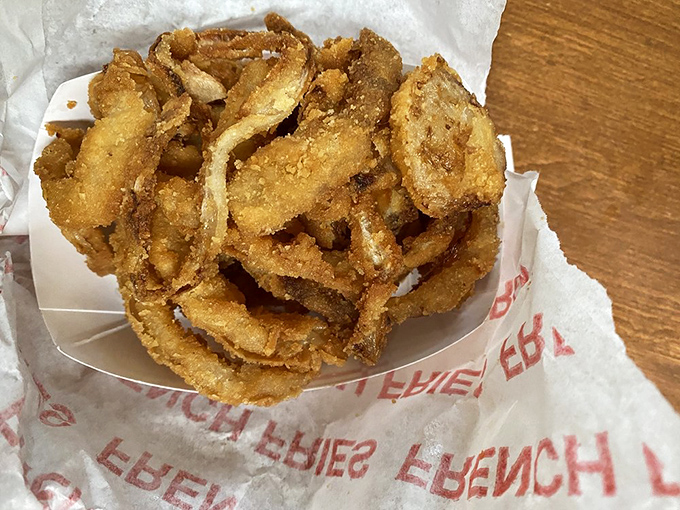 Onion rings with the perfect crunch-to-onion ratio &ndash; these golden halos of happiness are the unsung heroes of any diner meal.