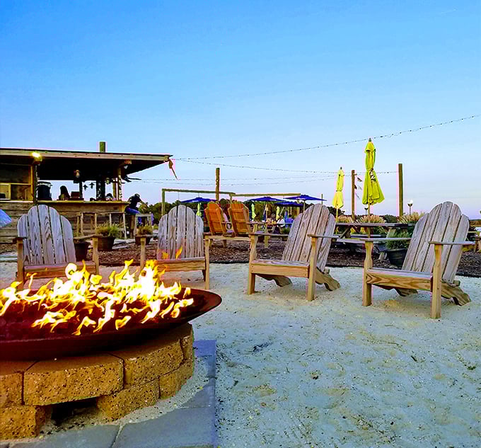 Adirondack chairs circle a fire pit as the sun sets, creating the perfect epilogue to an unforgettable meal at this Maryland institution.