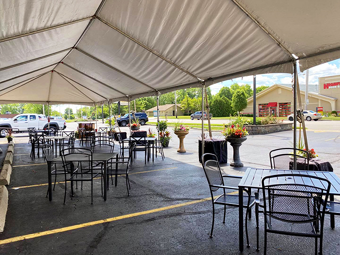 When Ohio weather cooperates, outdoor dining under the tent transforms parking lot asphalt into something approaching Mediterranean charm.