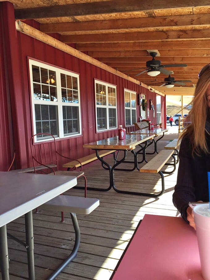 The porch – where the mountain air somehow makes everything taste even better. Nature's dining room with a side of hickory-scented bliss.