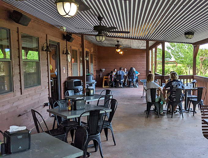 The covered patio offers al fresco dining without the Texas sun turning you into beef jerky. Smart design, smarter dining choice.