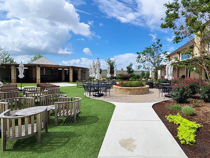 Garden seating areas blend manicured lawns with native plantings – proof that Mother Nature makes the best landscape designer.