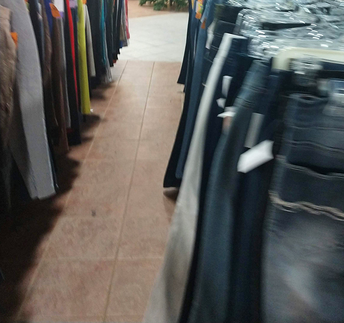 The men's section offers everything from work pants to weekend wear. Finding your size is like winning a small lottery of style.