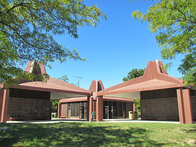 The bathhouse architecture brings surprising style to practical necessities, proving state parks care about aesthetics and hygiene equally.