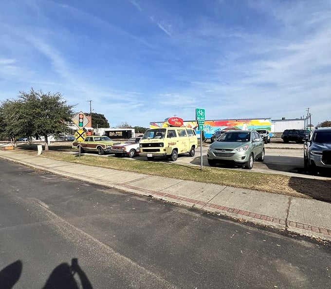 Even the parking area has character, with vintage vehicles adding to the retro atmosphere before you even step inside the market.
